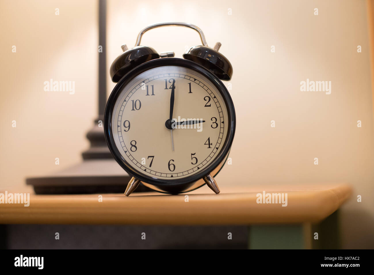 Close up on clock standing on a table Stock Photo - Alamy