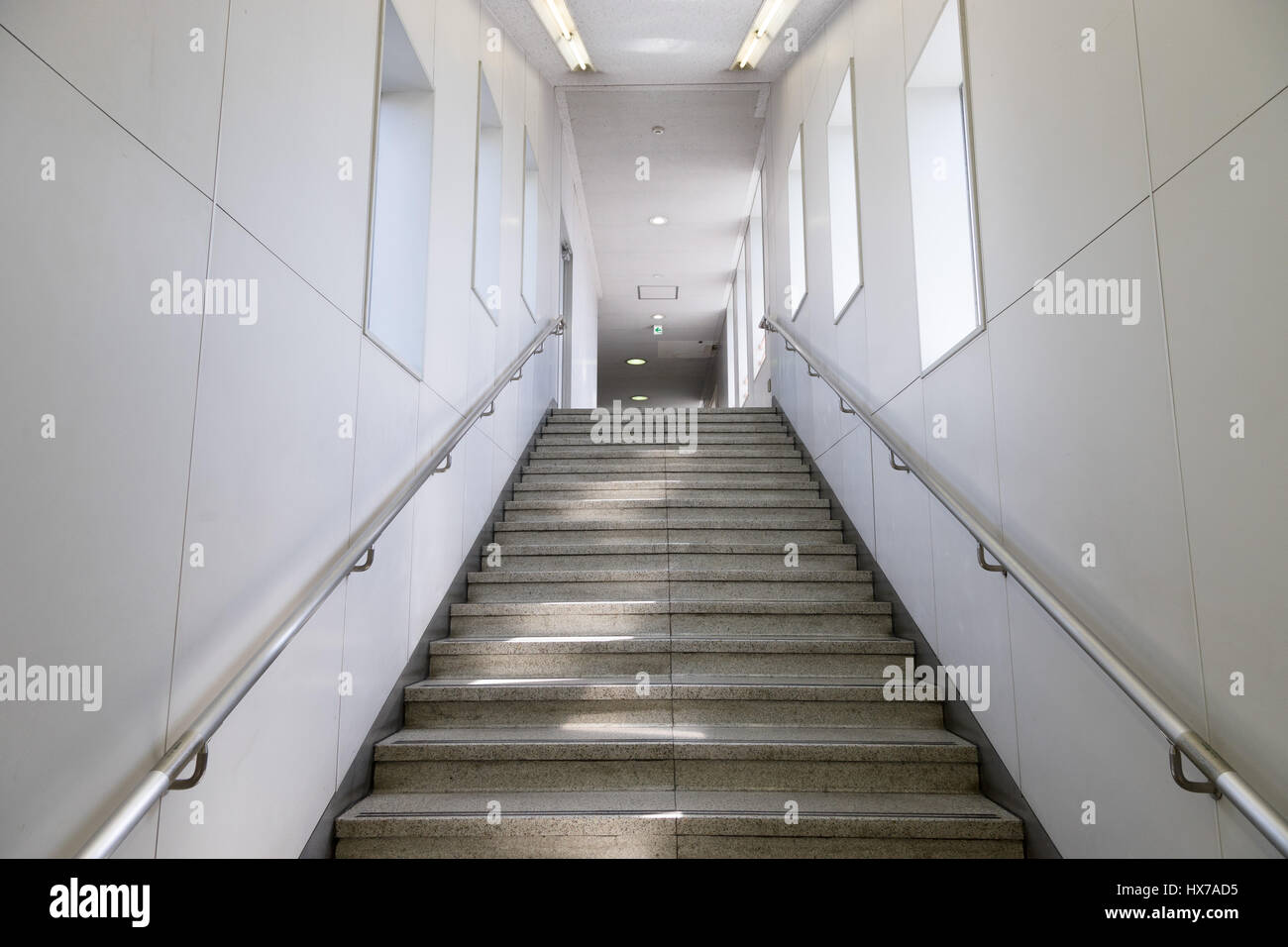 Passage way with stairs going underground in a subway Stock Photo - Alamy