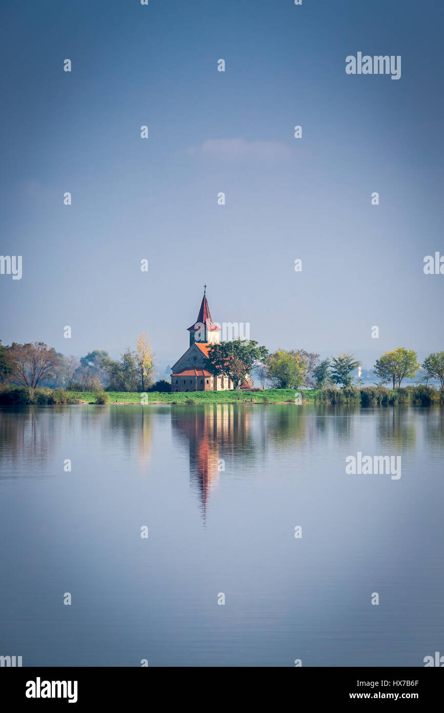 Beautiful church on a small island in summer Stock Photo - Alamy