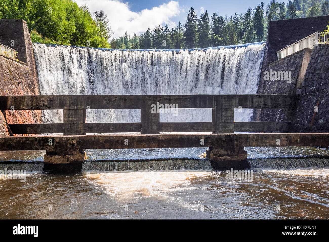 Stone dam creates a mountain waterfall in Poland Stock Photo - Alamy