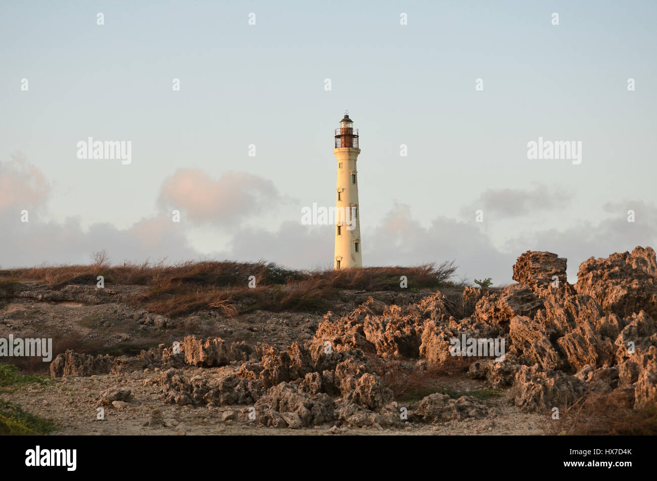 California lighthouse in Aruba with a volcanic rocks Stock Photo - Alamy