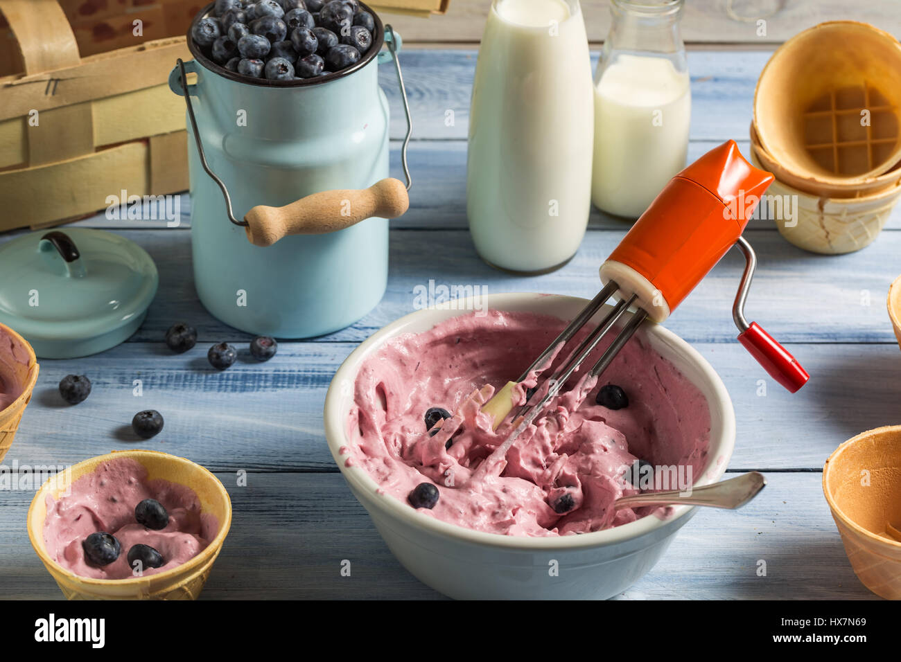 Homemade production line of blueberry ice cream Stock Photo - Alamy