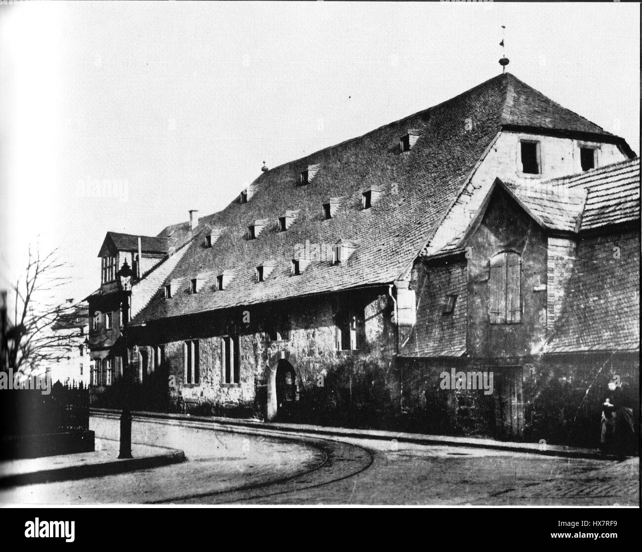 The Marburg Town Mill West Building, photographed in 1903, represents a ...