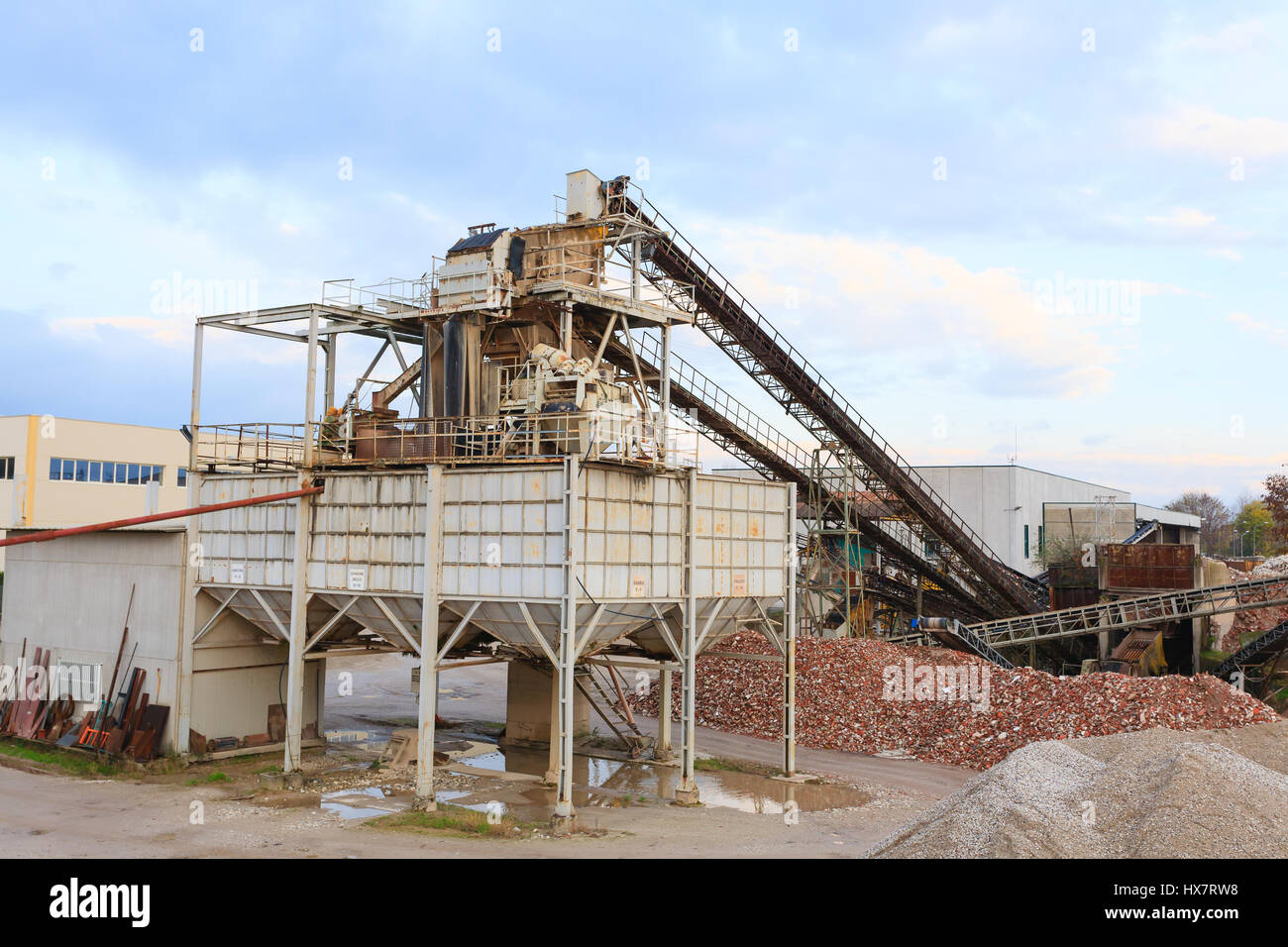 Stone quarry with silos and conveyor belts. Industrial equipment ...