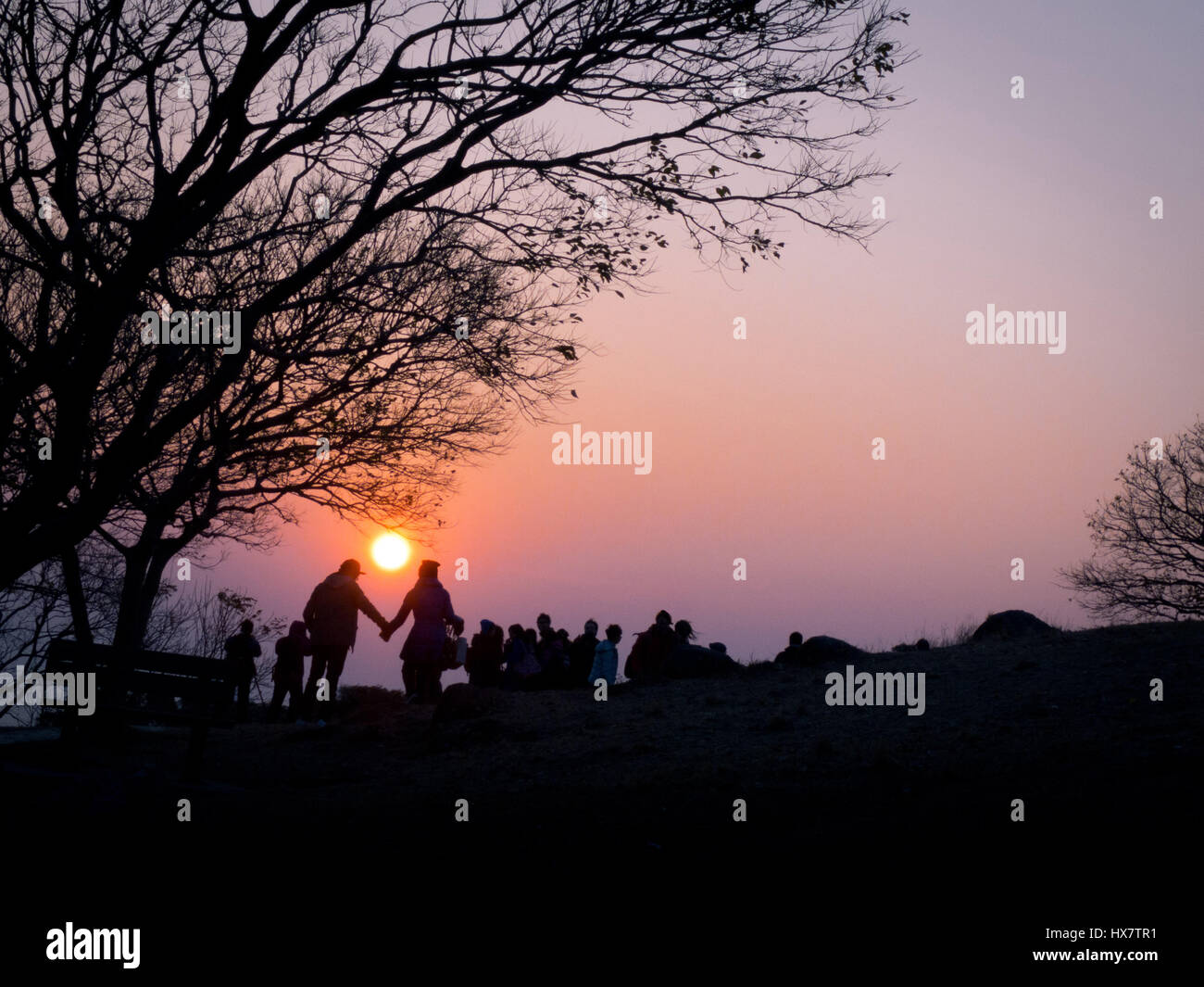 couple in romantic sunset Stock Photo - Alamy