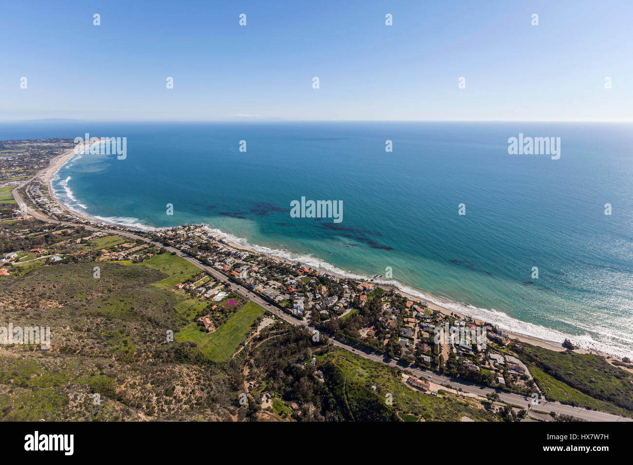 Aerial view of Pacific Ocean view homes north of Los Angeles in Malibu ...