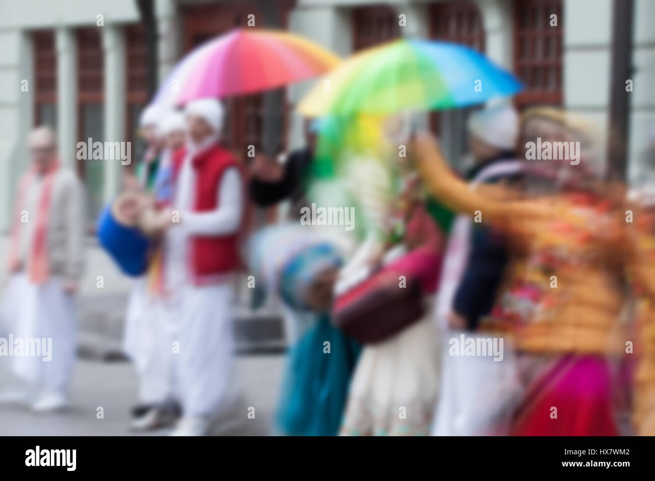 People group of Hare Krishna movement singing, dancing in the streets ...