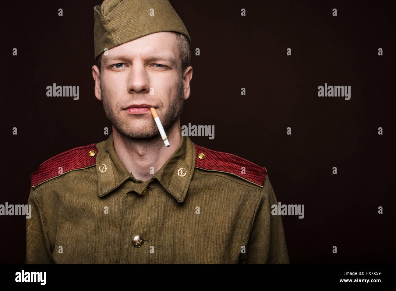 Russian soldier with second world war uniform. Studio portrait over ...