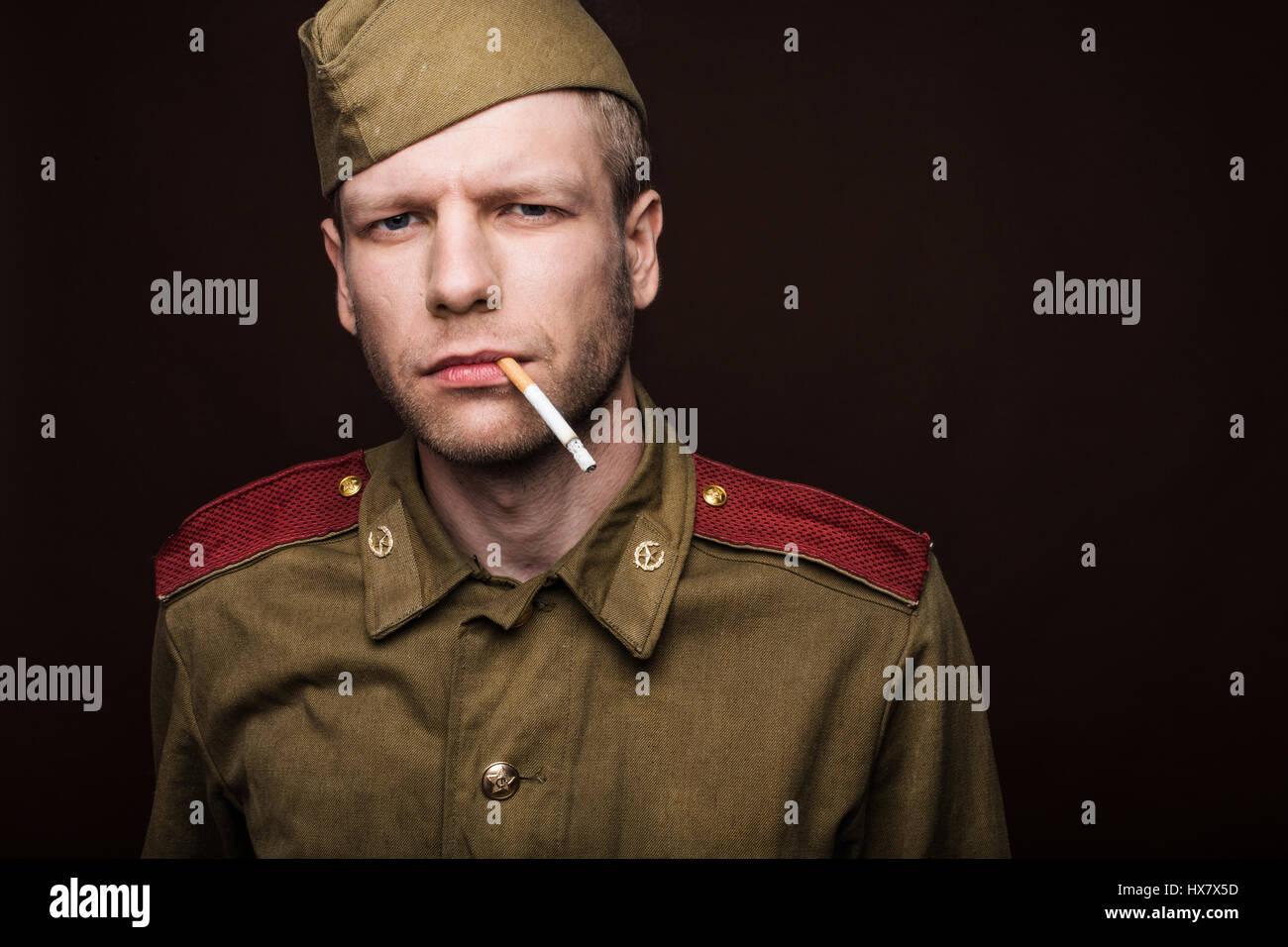 Russian soldier with second world war uniform. Studio portrait over ...