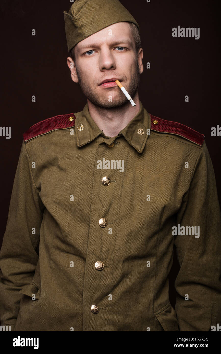 Russian soldier with second world war uniform. Studio portrait over ...