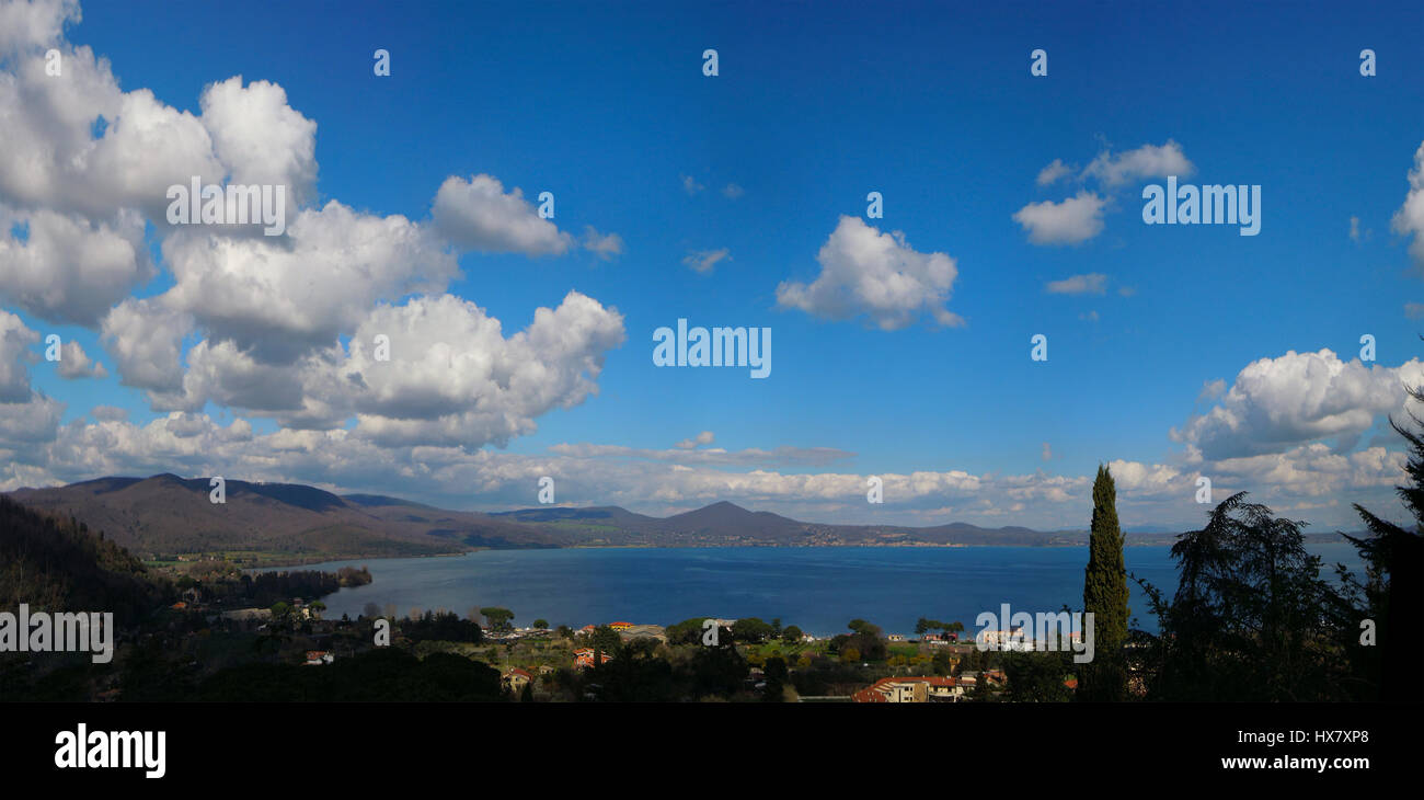 A panoramic view of Bracciano lake, near Rome, Italy in a clear, sunny ...