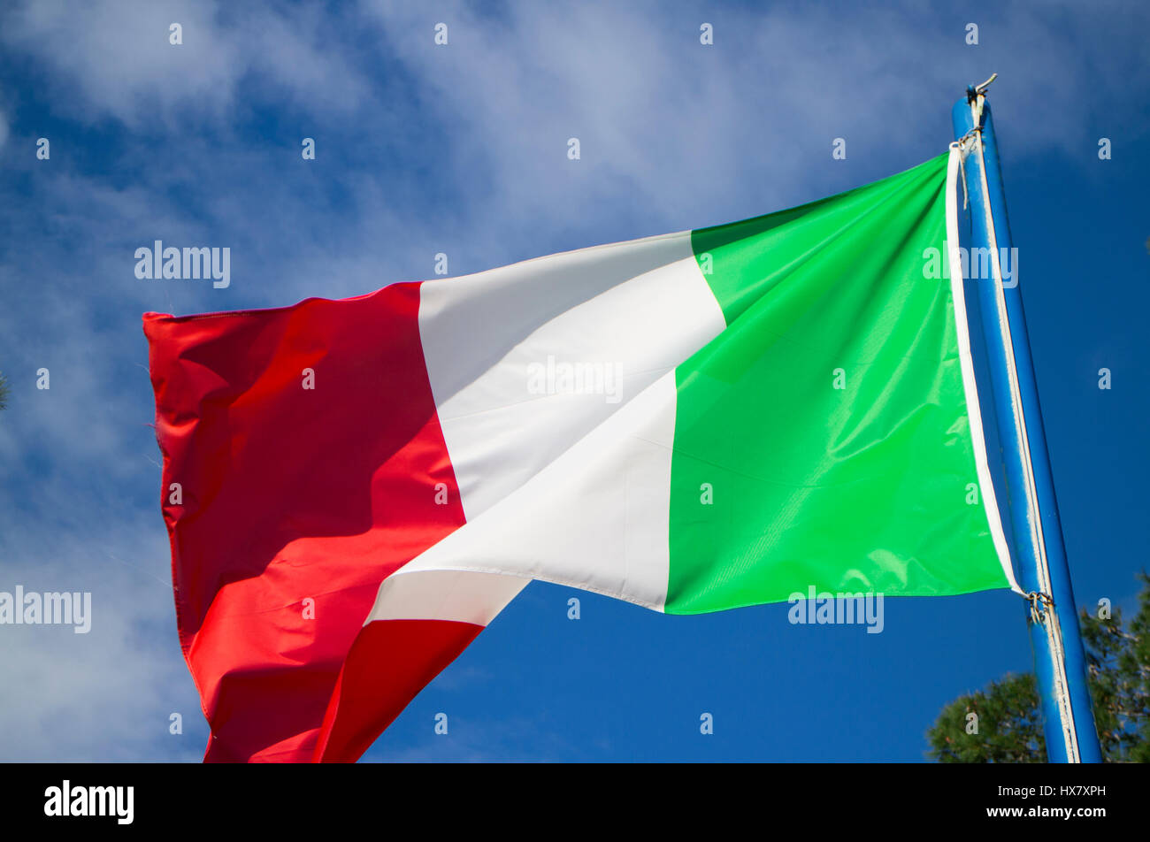 An italian flag waving in the wind in a clear, sunny day Stock Photo ...