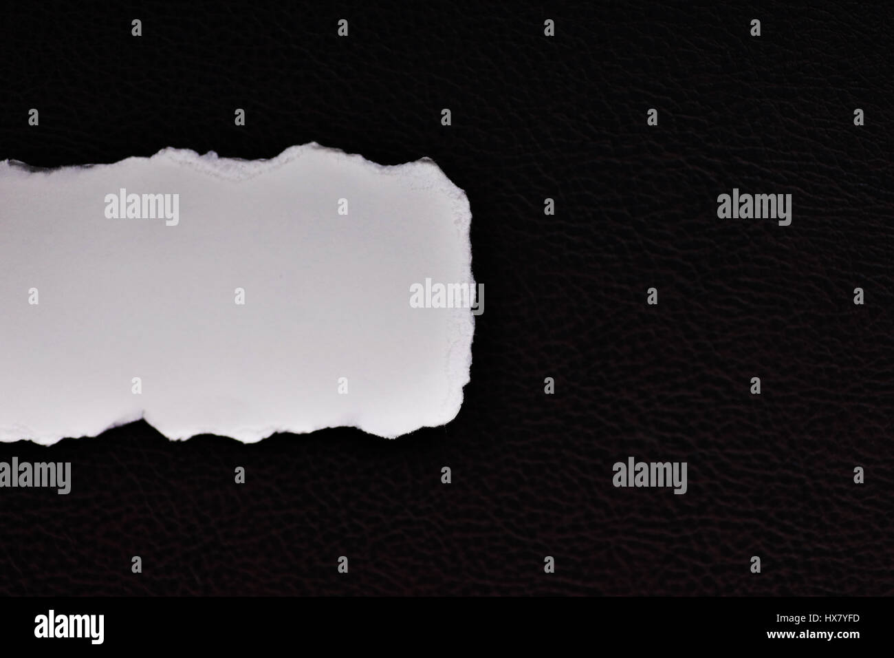 empty paper on dark textured skin for text Stock Photo - Alamy