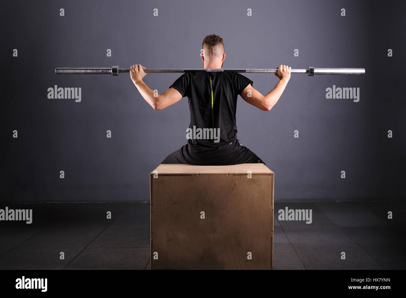 Crossfit fitness gym heavy weight lifting bar by strong man workout ...