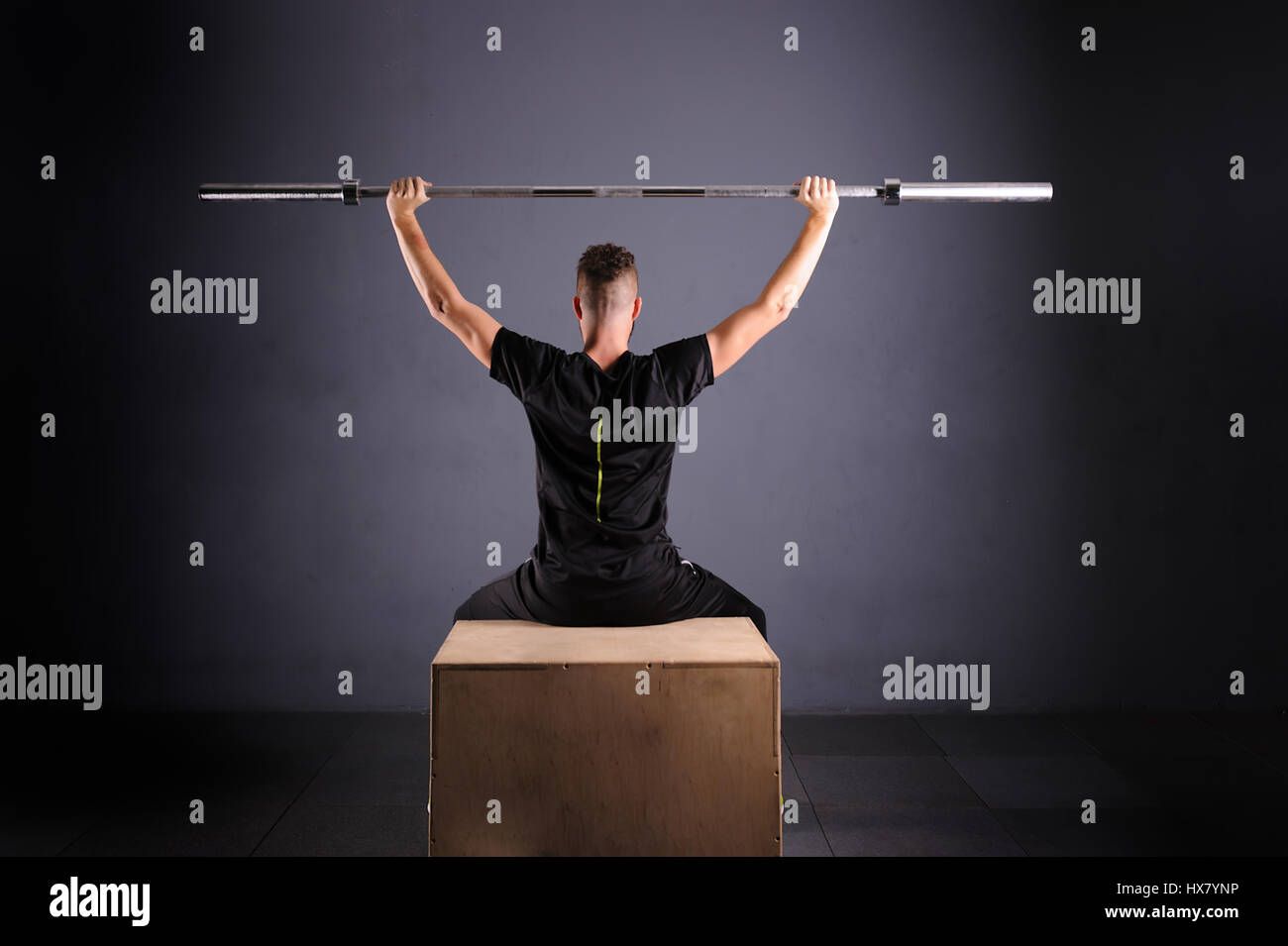 Crossfit fitness gym heavy weight lifting bar by strong man workout ...
