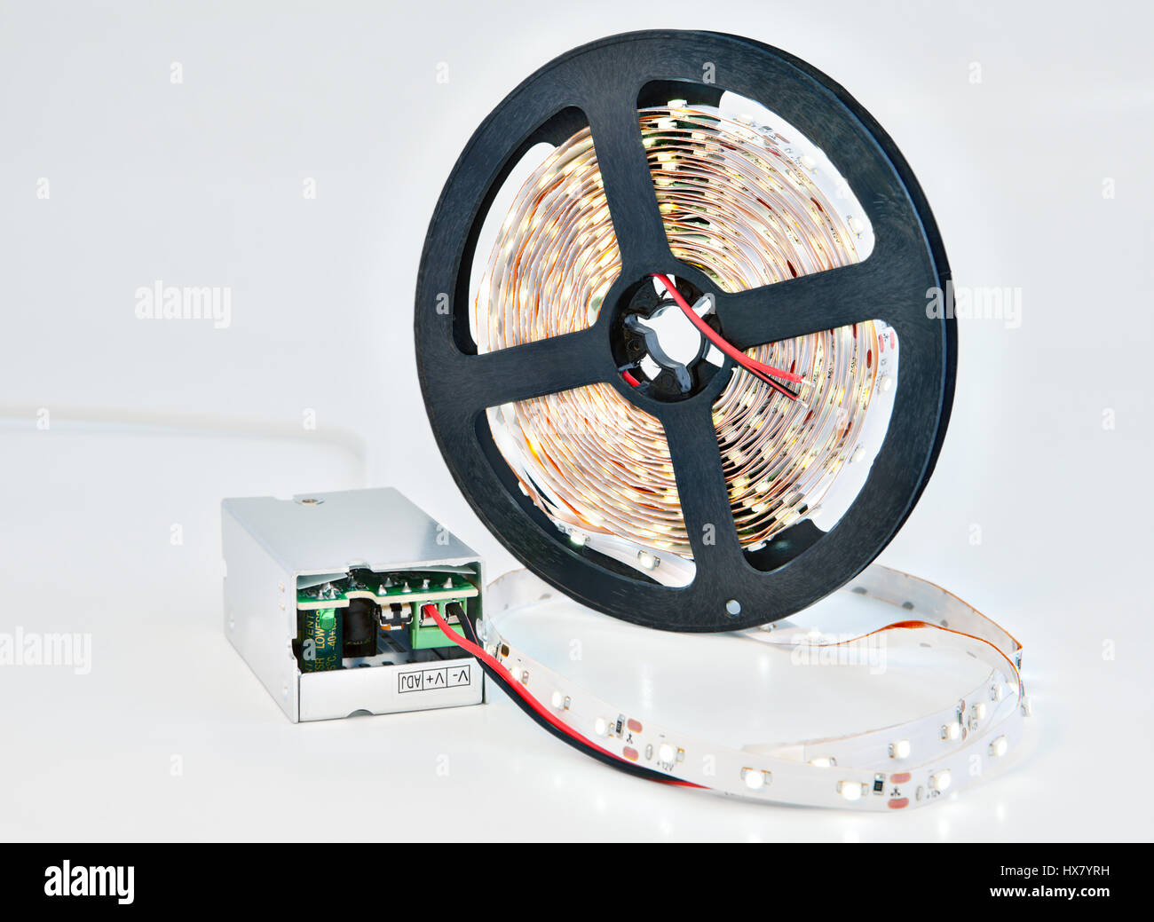 Illuminated LED diodes on a reel tape, with adapter voltage converter ...