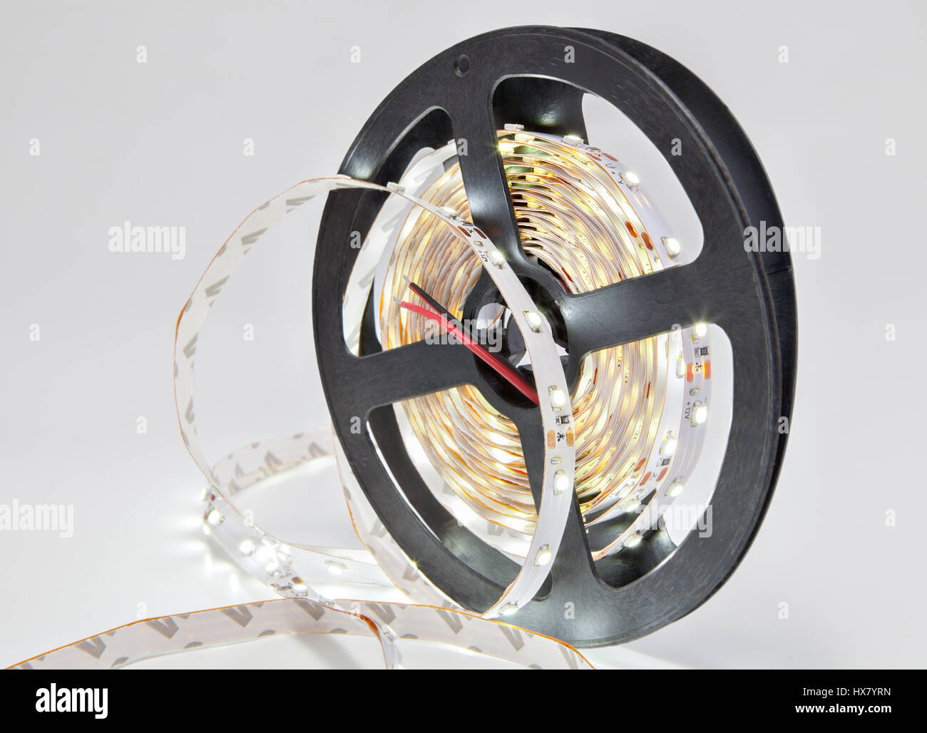 Close-up garland LED strips on plastic reel Stock Photo - Alamy
