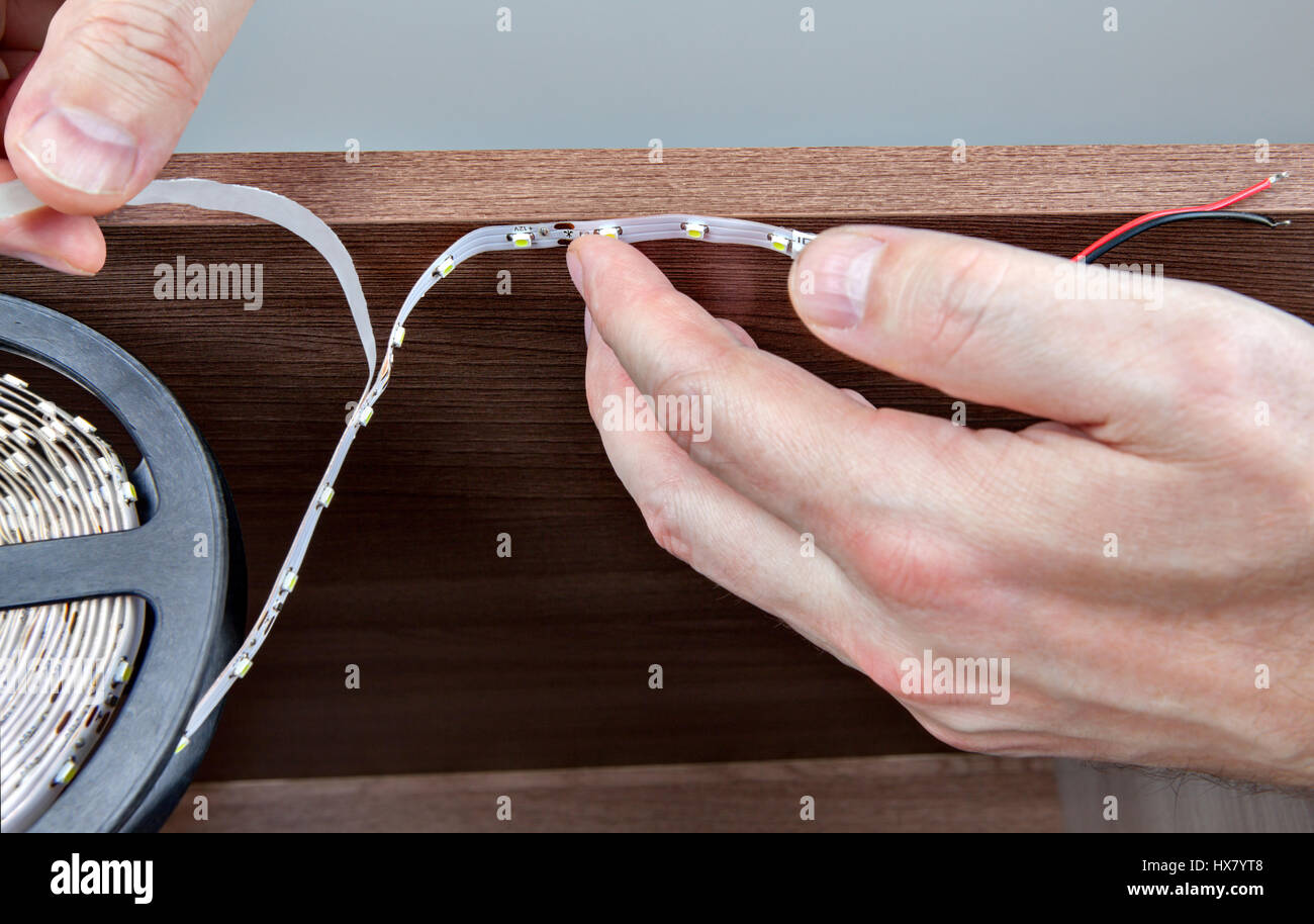 Installation of decorative LED lighting inside the furniture Stock ...