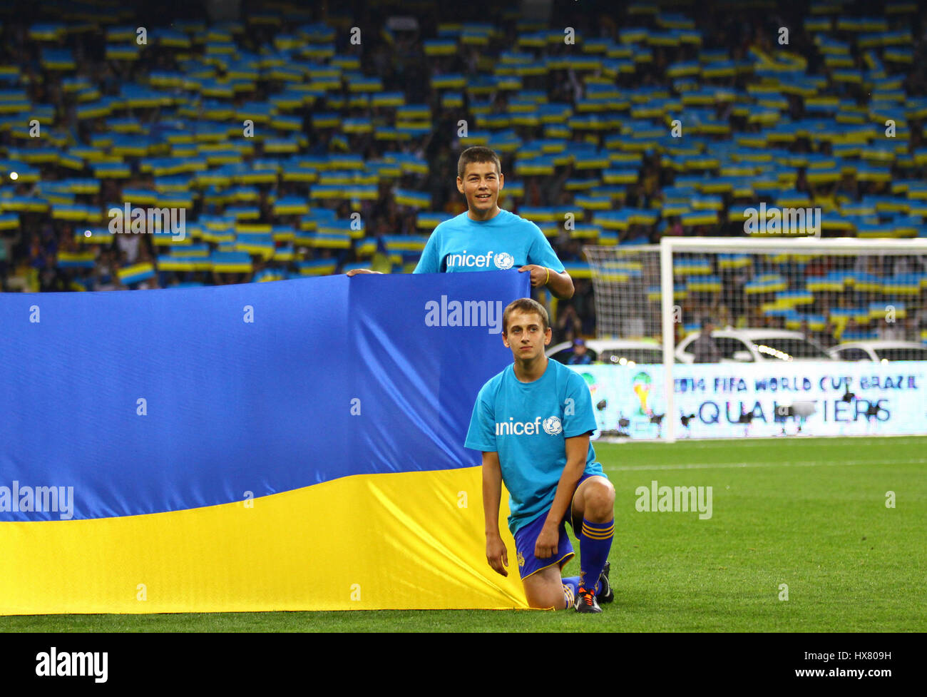 KYIV, UKRAINE - SEPTEMBER 10, 2013: Unrecognisable children hold the ...
