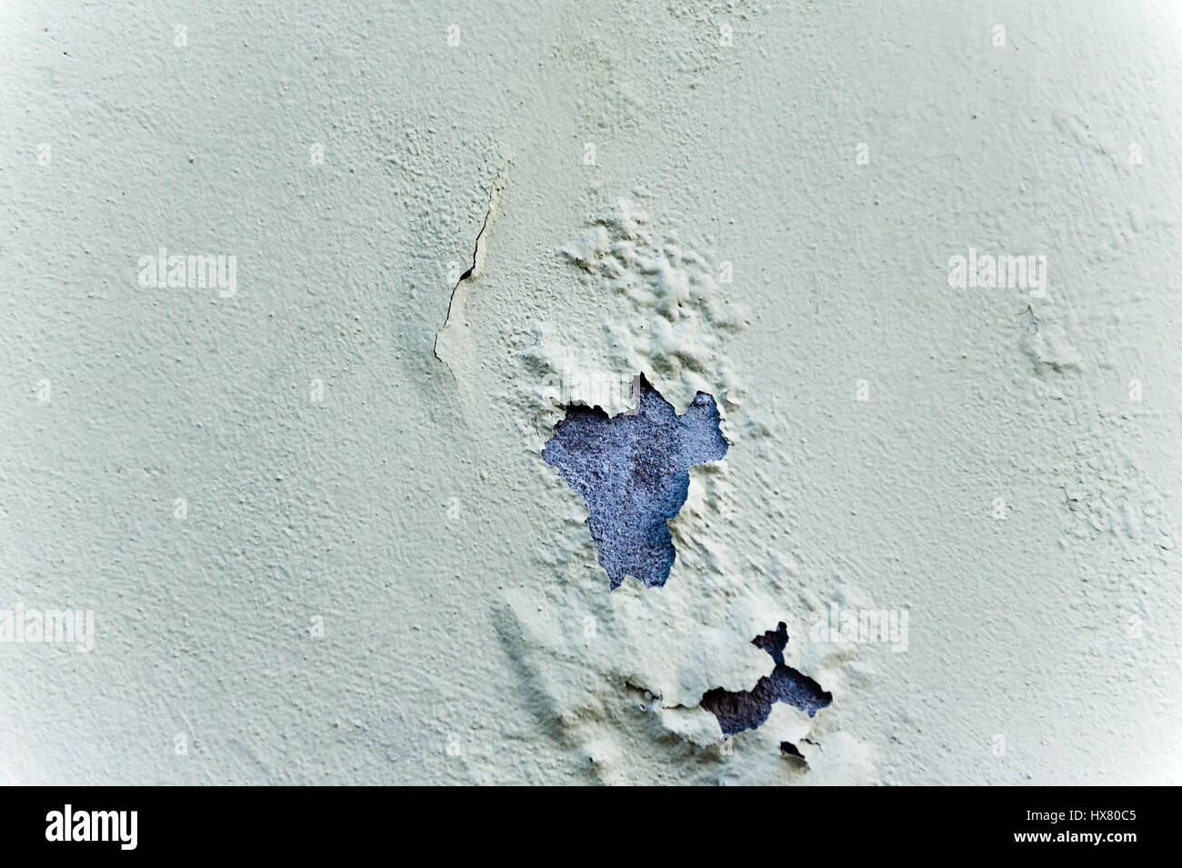 Rotten concrete wall with blown paint Stock Photo - Alamy
