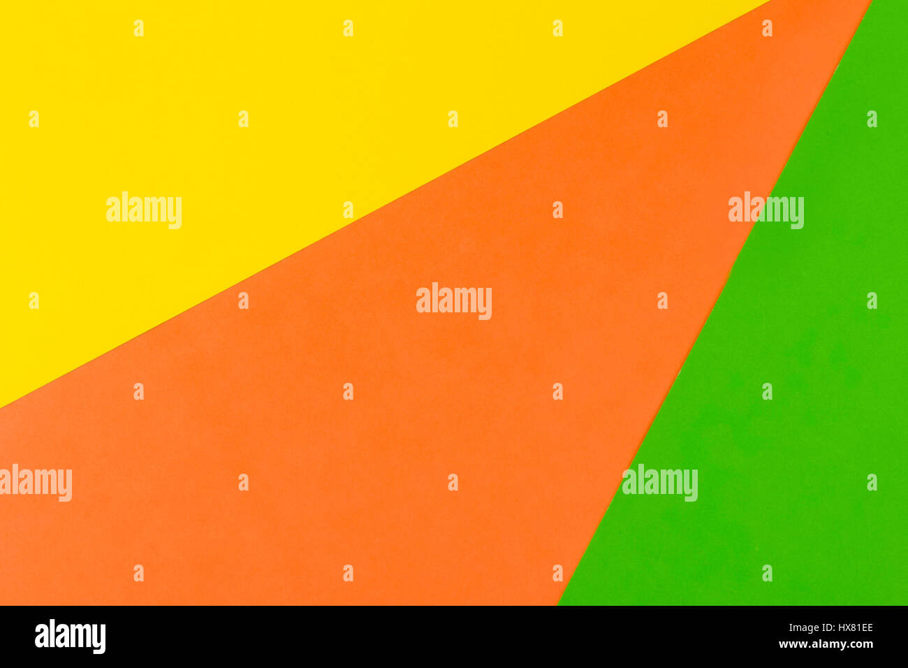 Yellow, green and orange color paper background Stock Photo - Alamy
