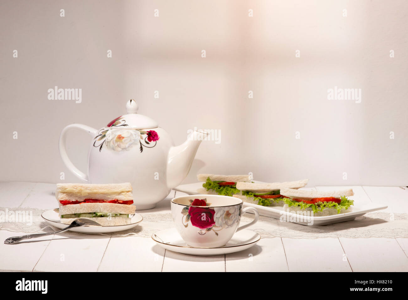 Afternoon tea table. tea set with sandwiches Stock Photo - Alamy