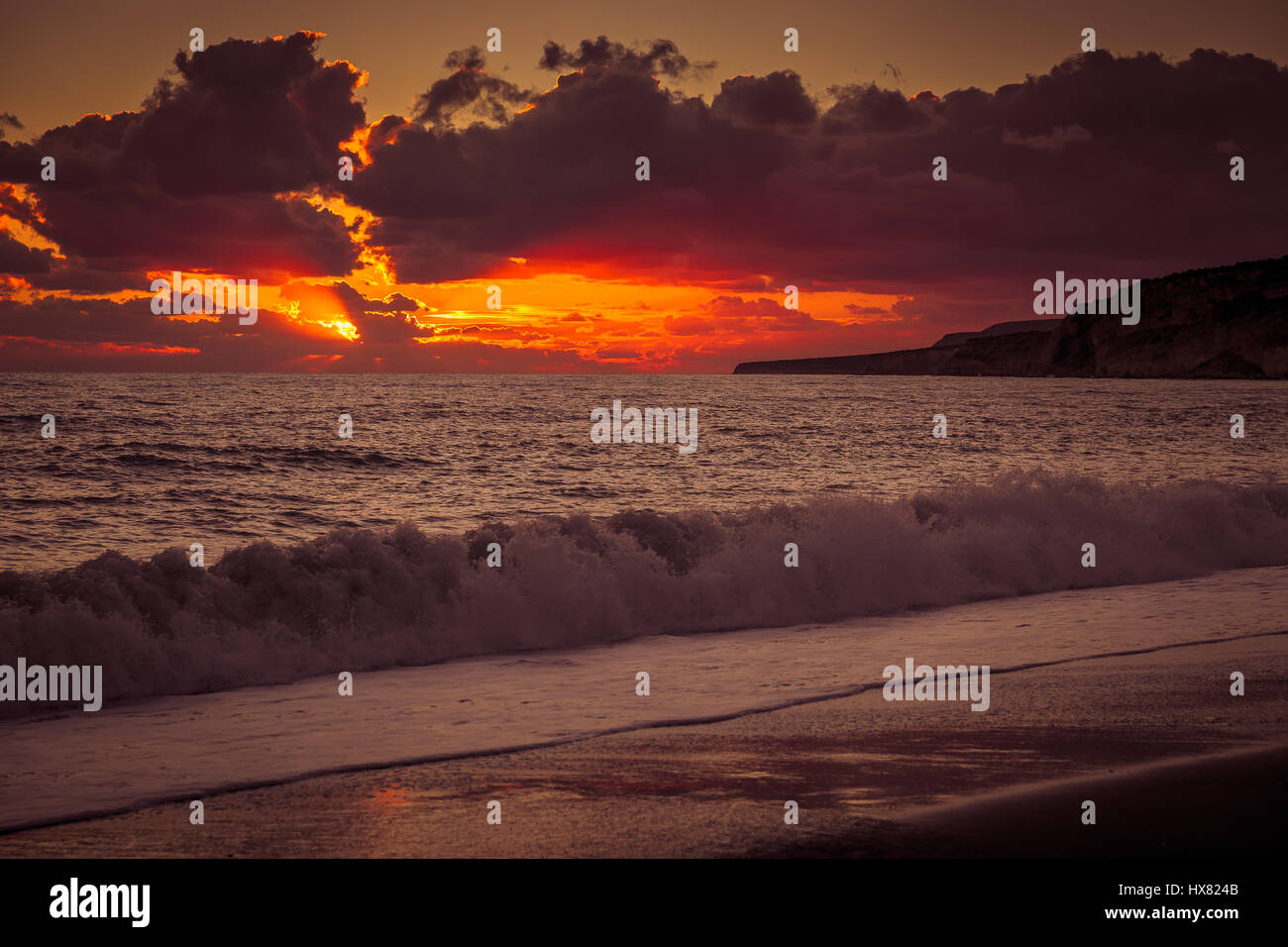 Sunset in the sea, Cyprus Stock Photo - Alamy