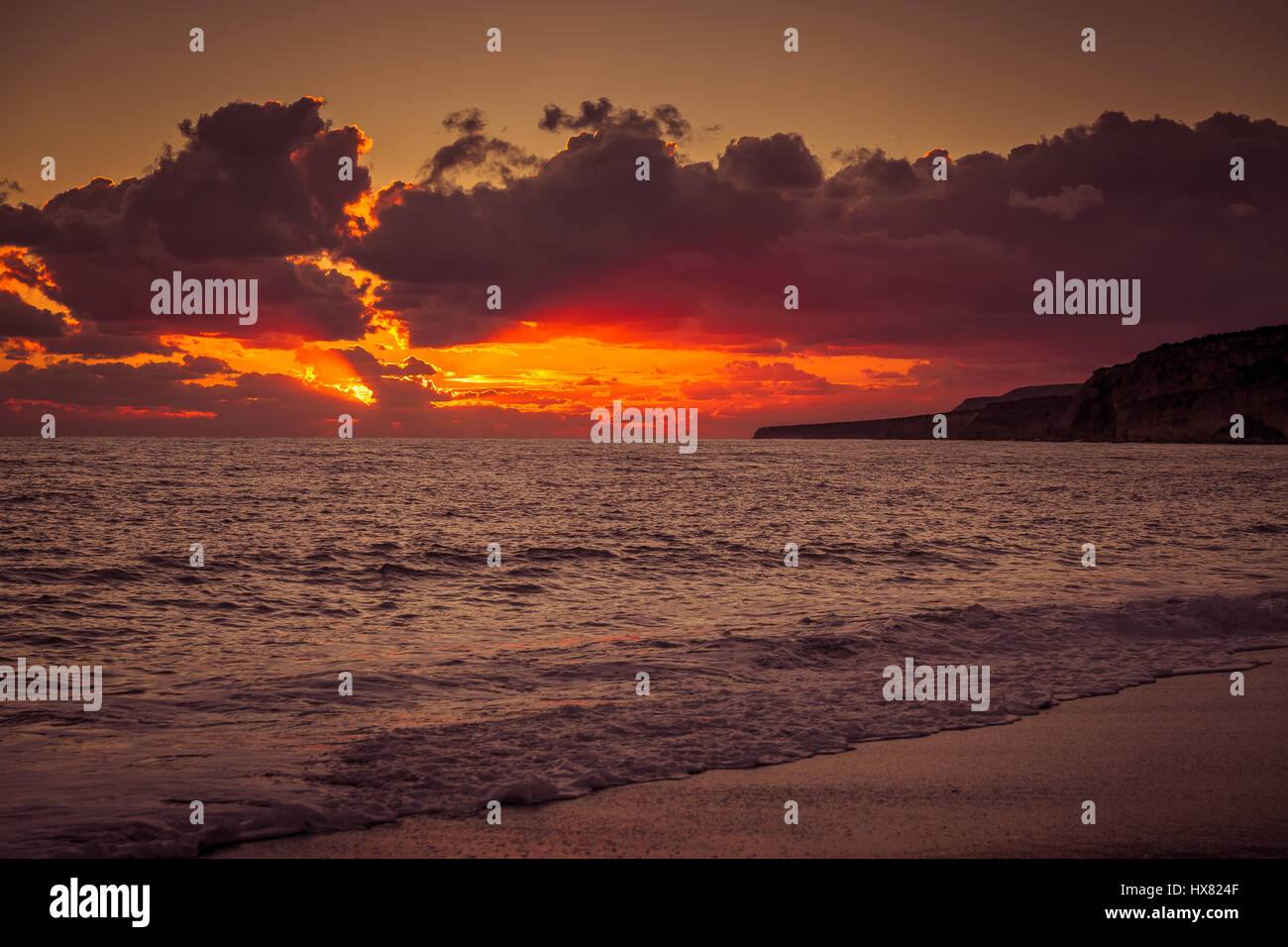 Sunset in the sea, Cyprus Stock Photo - Alamy