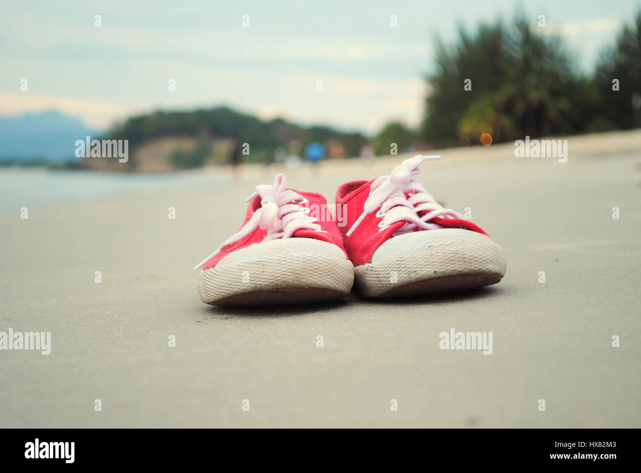 Shoe At The Beach Stock Photo - Alamy