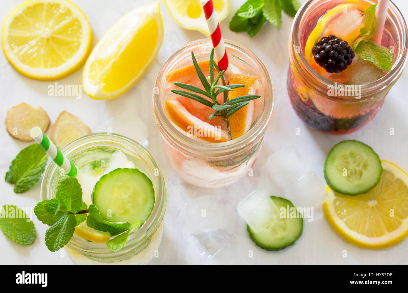 Fruit refreshing water. Various summer drinks with blackberries ...