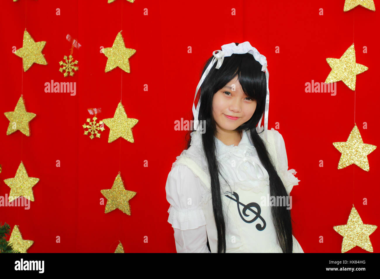 Bangkok - Dec 28: An unidentified Japanese anime cosplay pose in COSCOM ...