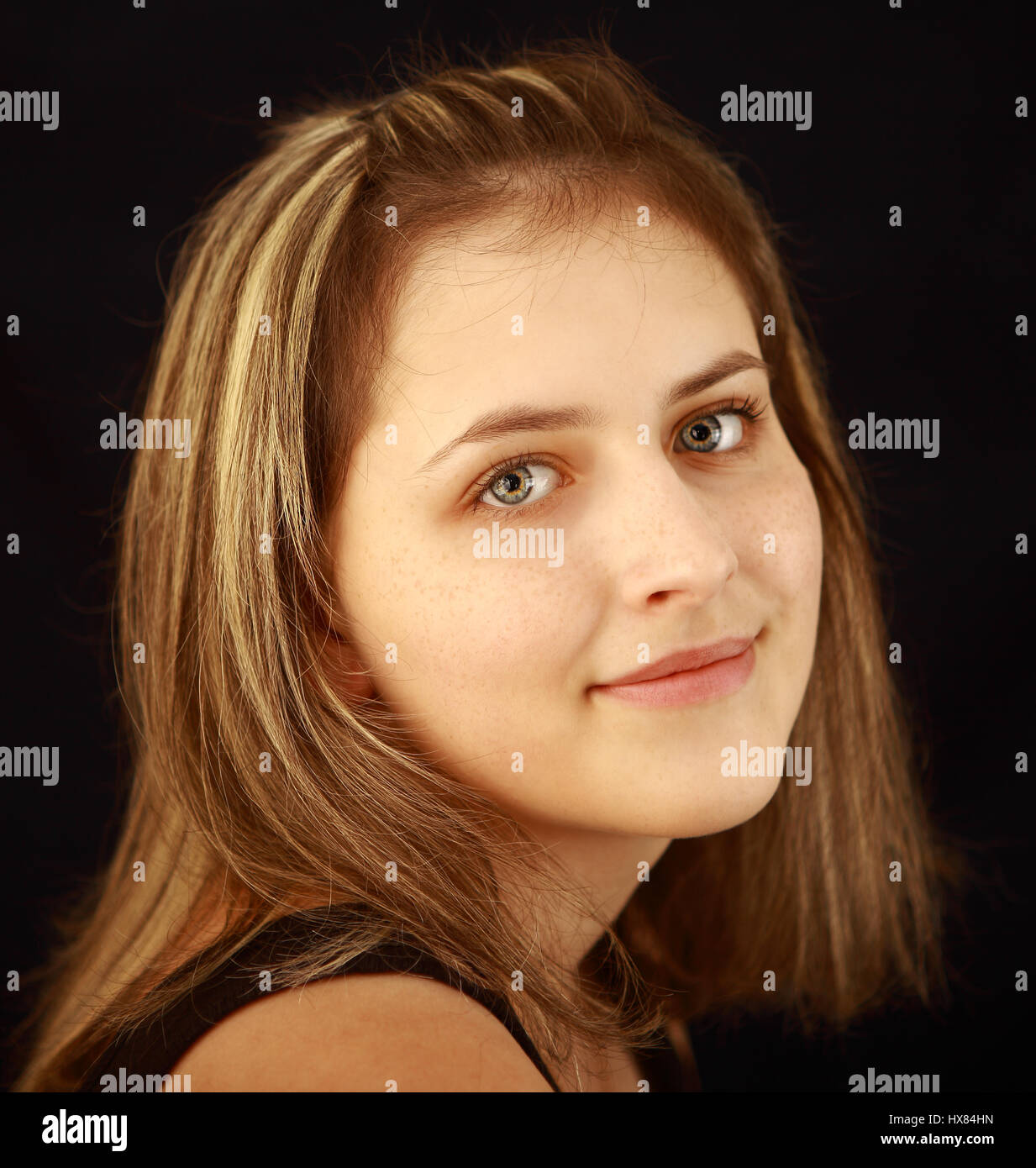One girl teenager, aged 17, a natural beauty, smile, freckles on his ...