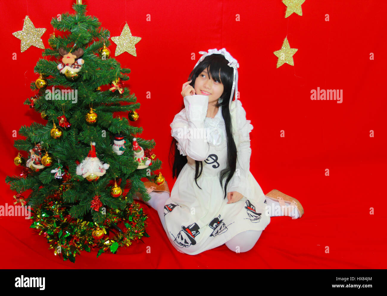 Bangkok - Dec 28: An unidentified Japanese anime cosplay pose in COSCOM ...