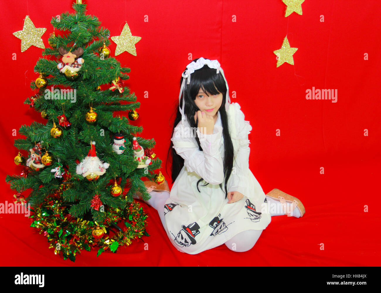 Bangkok - Dec 28: An unidentified Japanese anime cosplay pose in COSCOM ...