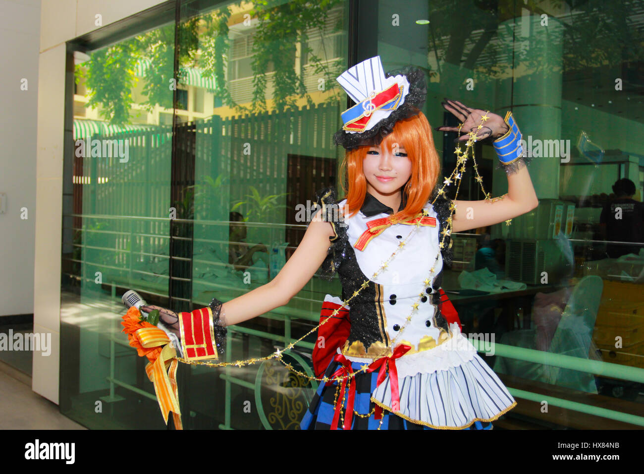 Bangkok - Dec 28: An unidentified Japanese anime cosplay pose in COSCOM ...