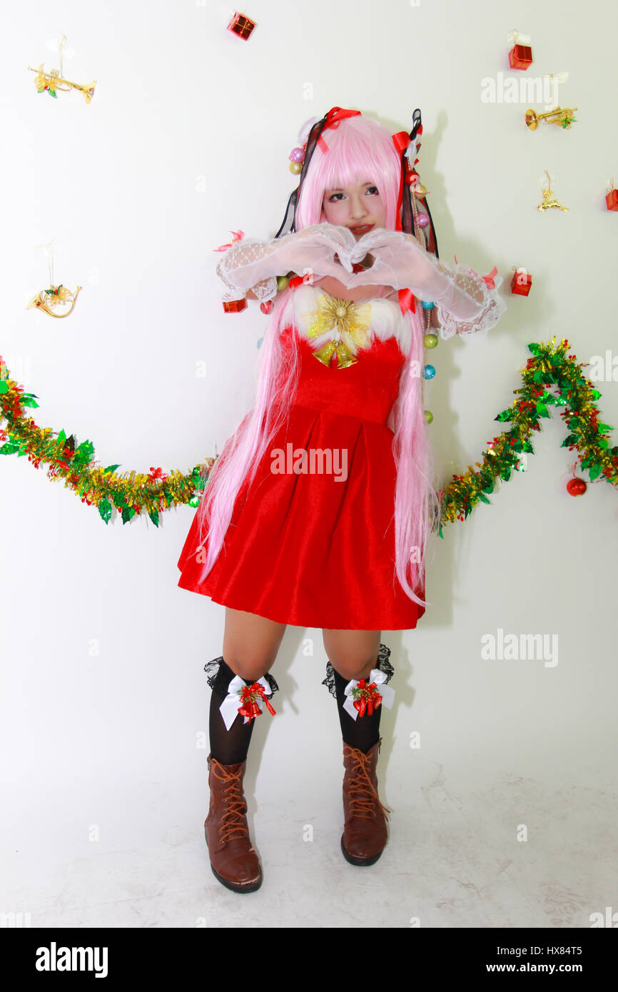Bangkok - Dec 28: An unidentified Japanese anime cosplay pose in COSCOM ...
