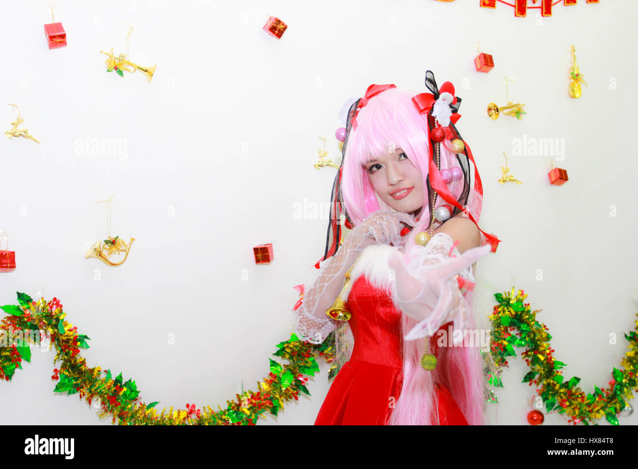 Bangkok - Dec 28: An unidentified Japanese anime cosplay pose in COSCOM ...