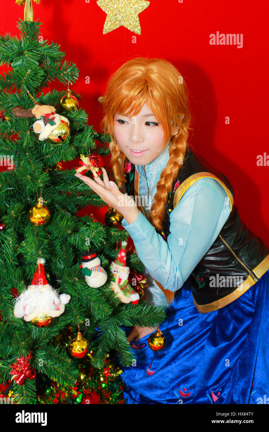 Bangkok - Dec 28: An unidentified Japanese anime cosplay pose in COSCOM ...