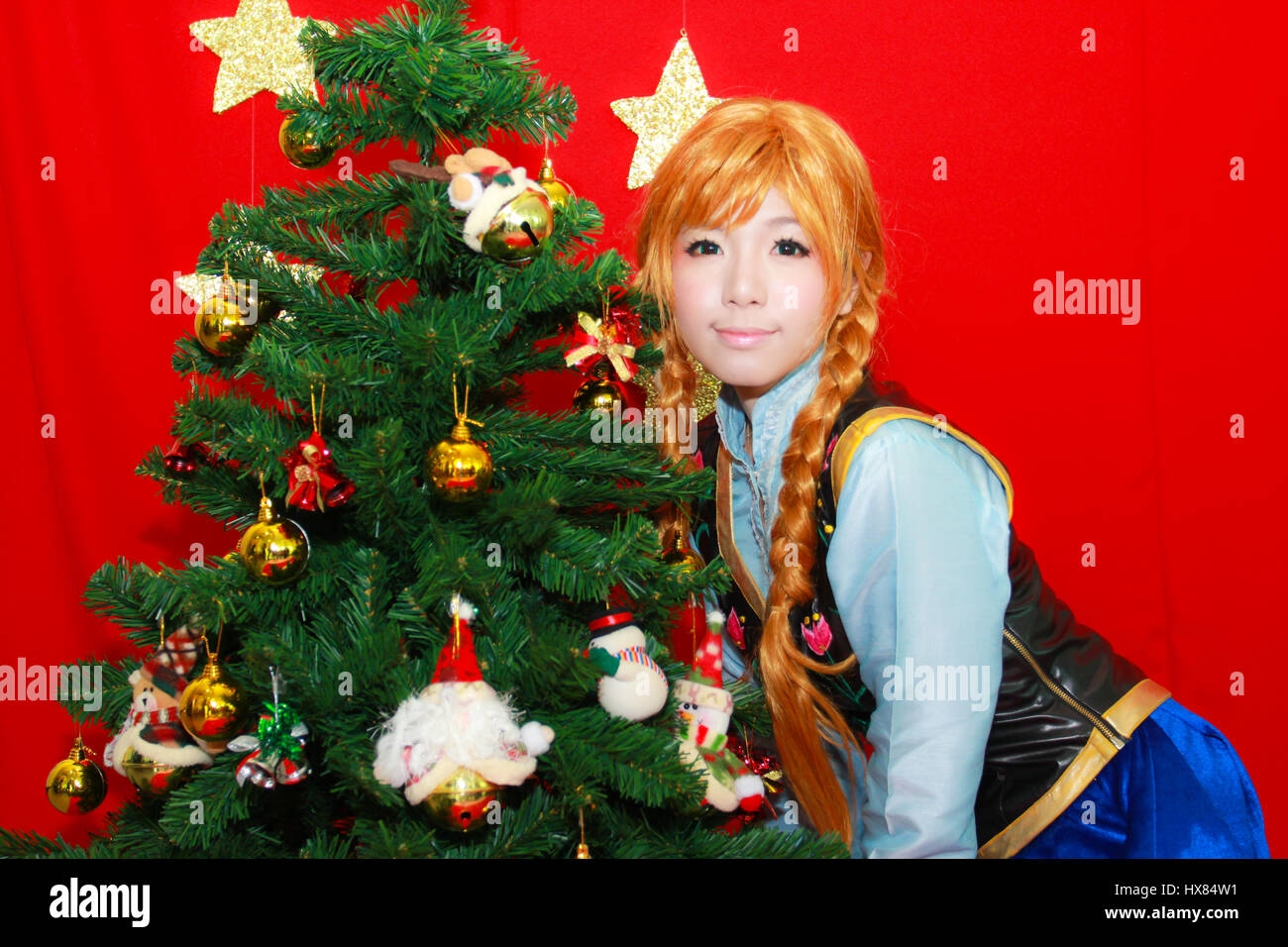 Bangkok - Dec 28: An unidentified Japanese anime cosplay pose in COSCOM ...