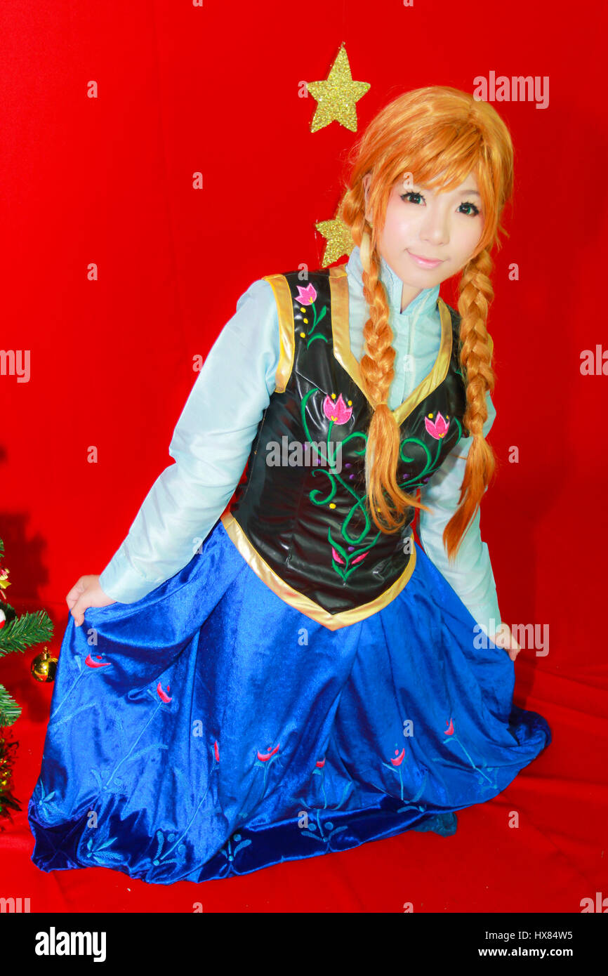 Bangkok - Dec 28: An unidentified Japanese anime cosplay pose in COSCOM ...