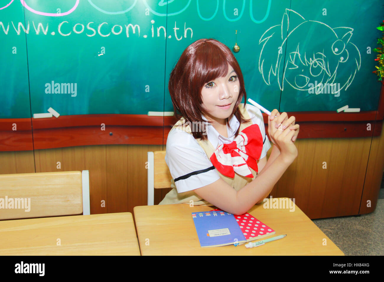 Bangkok - Dec 28: An unidentified Japanese anime cosplay pose in COSCOM ...