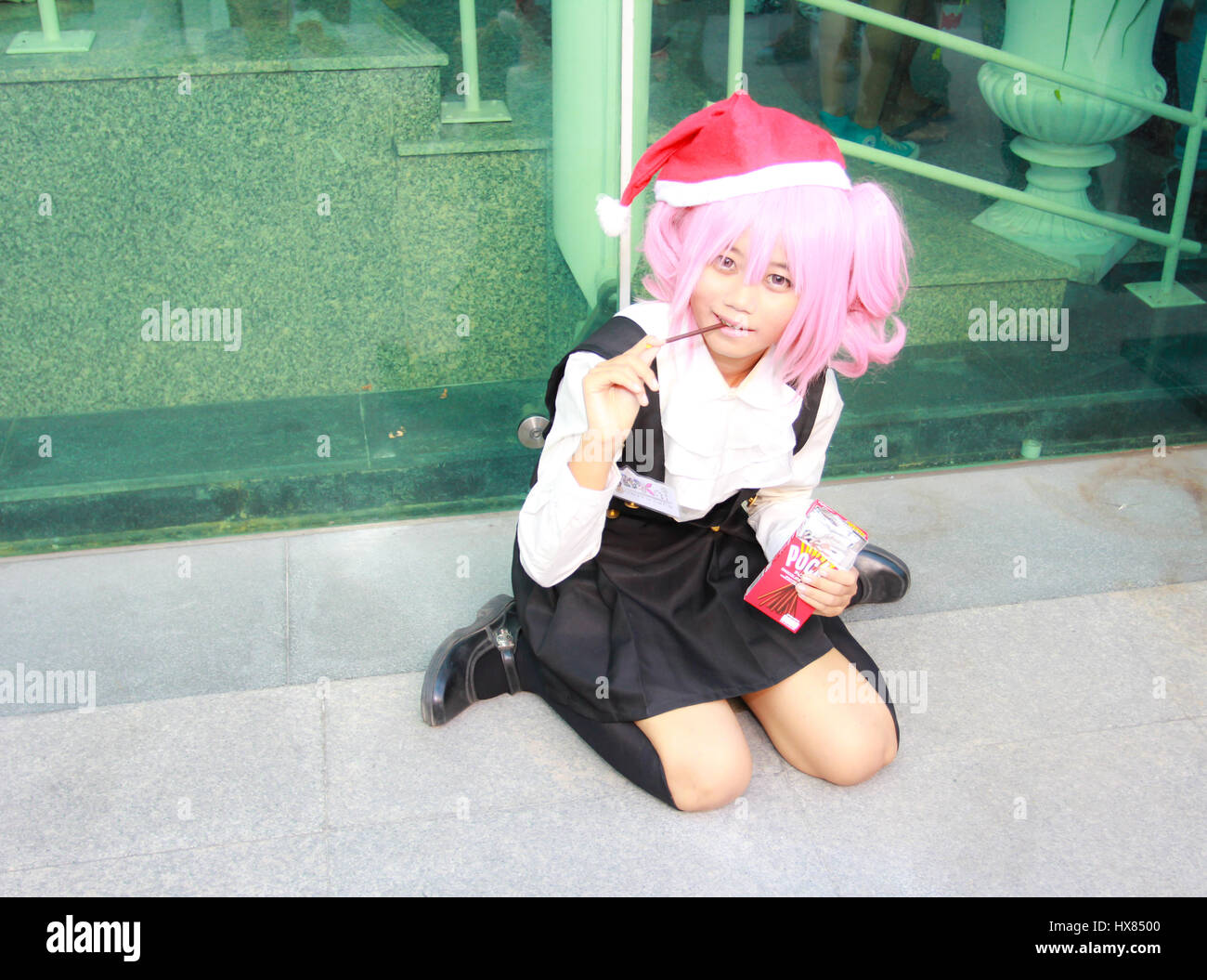 Bangkok - Dec 28: An unidentified Japanese anime cosplay pose in COSCOM ...