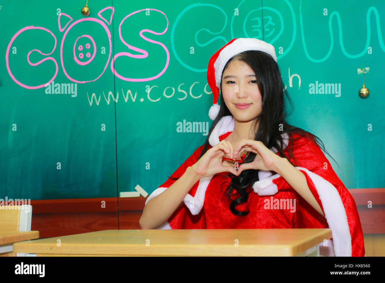 Bangkok - Dec 28: An unidentified Japanese anime cosplay pose in COSCOM ...