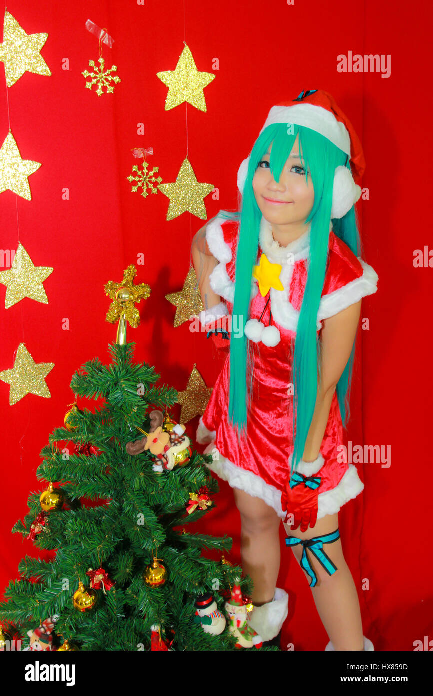 Bangkok - Dec 28: An unidentified Japanese anime cosplay pose in COSCOM ...