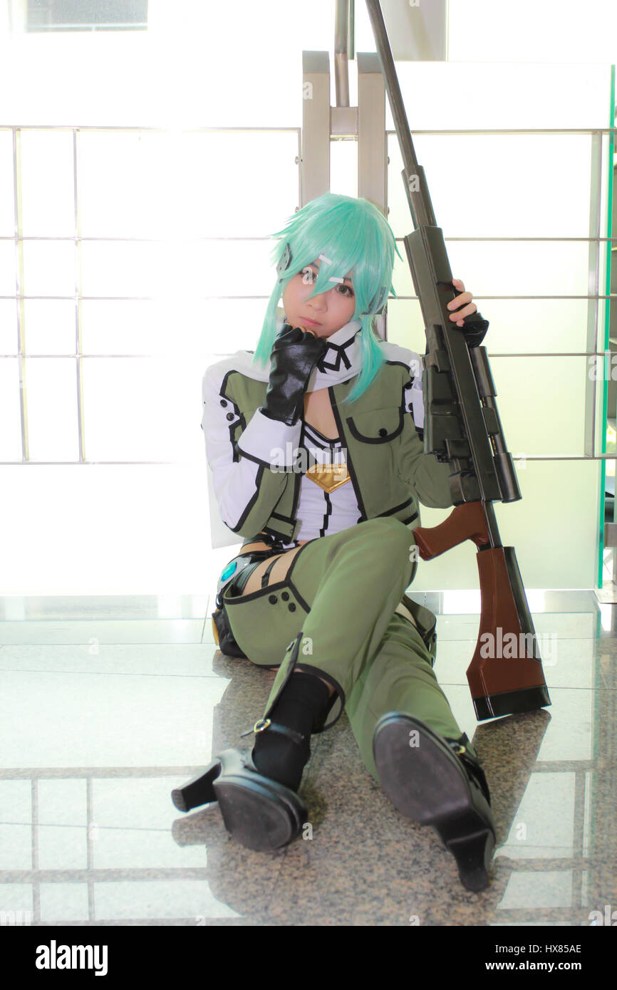 Bangkok - Dec 28: An unidentified Japanese anime cosplay pose in COSCOM ...