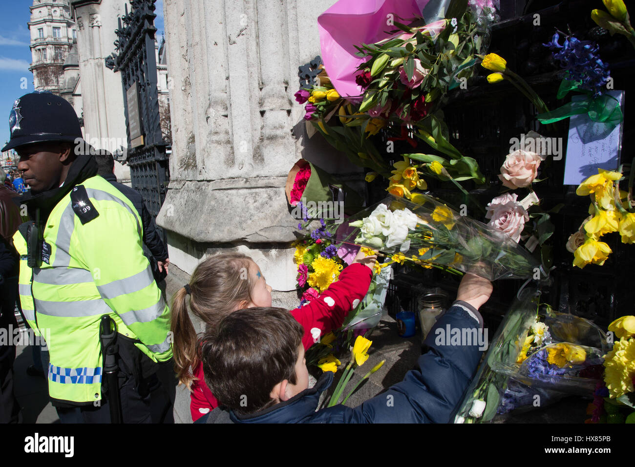 London UK 25th march 2017 Children leave floral tributes in honour of ...