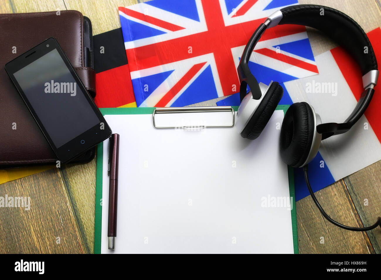 blank paper on wooden textural desk with mobile phone Stock Photo - Alamy