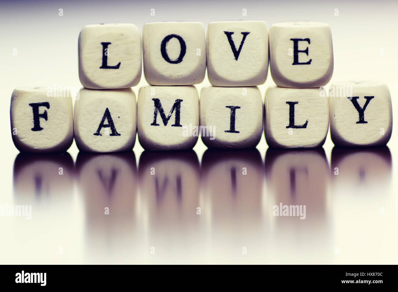 wood text cube family Stock Photo - Alamy