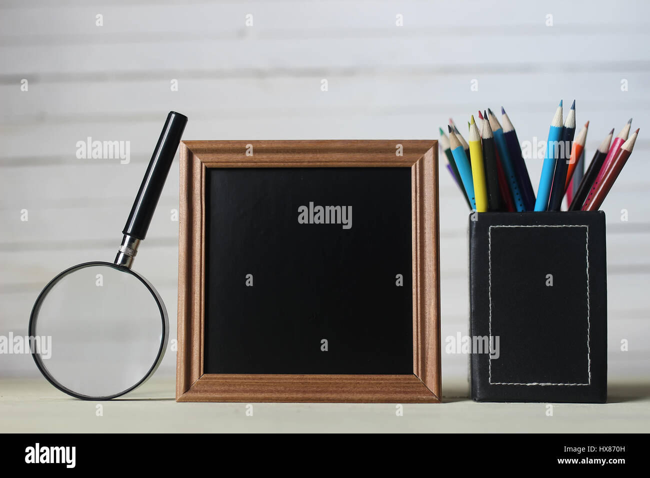 frame for text books and watch Stock Photo - Alamy