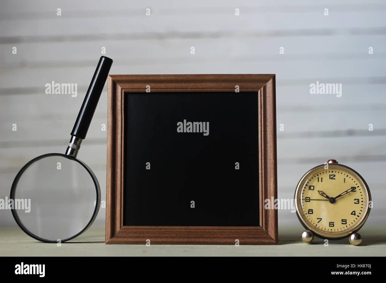 frame for text books and watch Stock Photo - Alamy